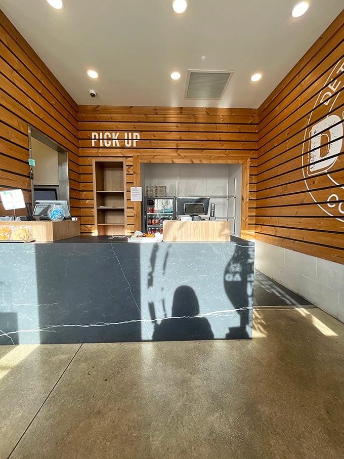 Step into a wood-paneled wonderland where the aroma of crispy wings mingles with the sweet scent of anticipation.