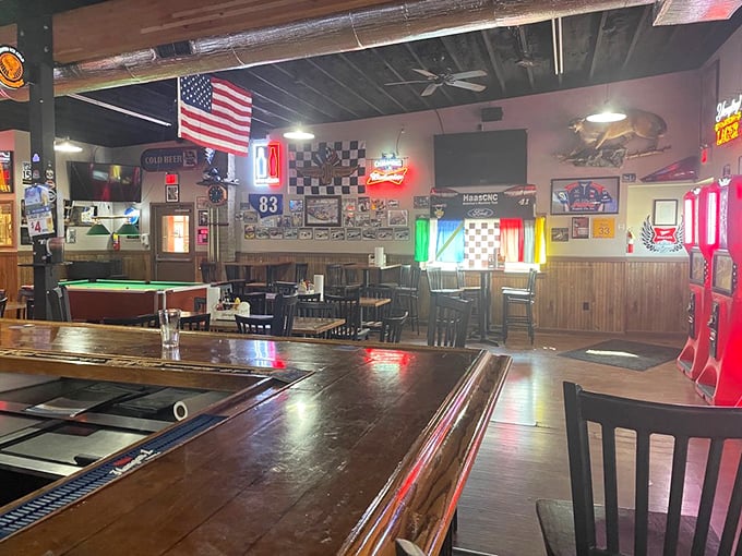 Step into a time warp where NASCAR meets nostalgia. This cozy interior is like your cool uncle's man cave, but with better food and friendlier faces.