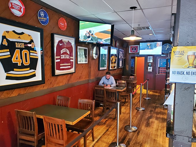 Step into a sports lover's paradise, where jerseys are the wallpaper and every seat feels like courtside.