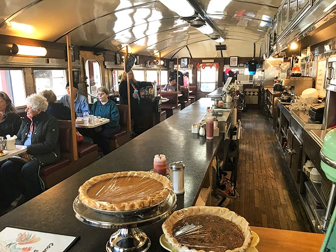 Inside this narrow slice of Americana, the curved ceiling and worn wooden floors have witnessed decades of Vermont mornings and countless coffee refills.