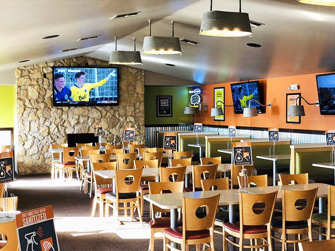 Inside, stone walls and wooden chairs create that perfect sports-watching sanctuary where the only difficult decision is which game to watch.