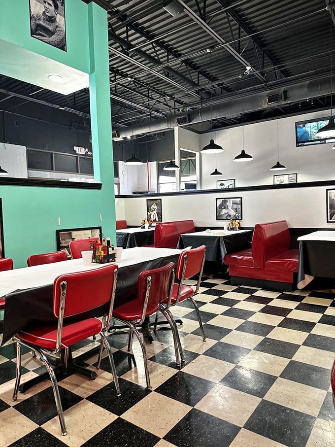 Step inside to a symphony of red vinyl and checkerboard floors. This isn't just nostalgic design&mdash;it's a promise that comfort food awaits.