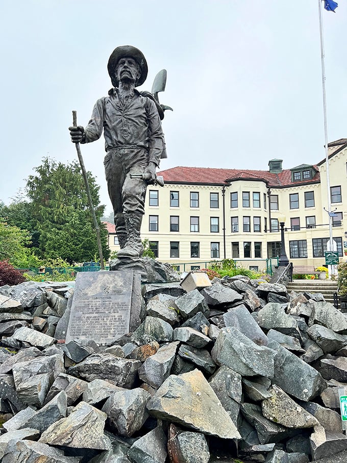 The Prospector stands tall, a bronze tribute to Alaskan grit. He's seen more adventures than Indiana Jones, without the snakes!