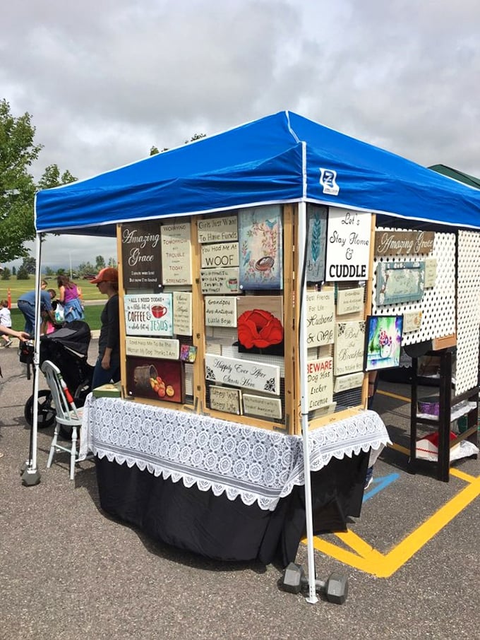 Who knew inspiration came in bite-sized pieces? This booth's serving up wisdom with a side of whimsy. I'll take two, please!