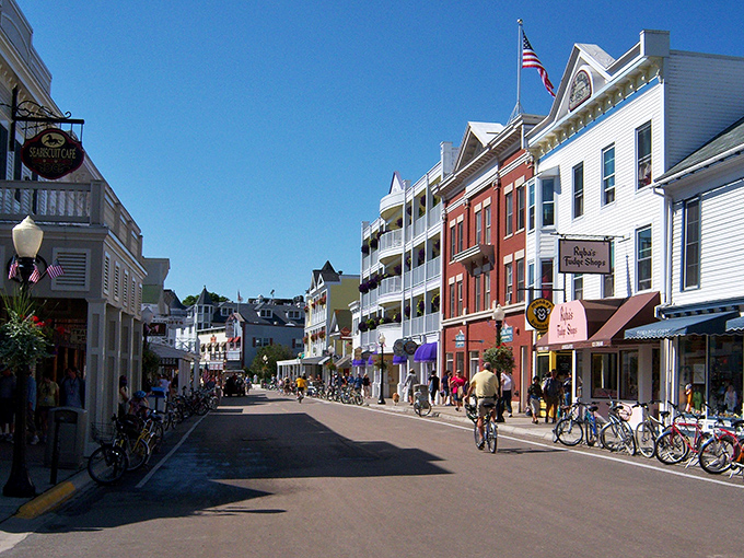 Pedal power and horse power collide in this charming downtown scene. It's as if Norman Rockwell and Lance Armstrong collaborated on a painting of small-town Americana.