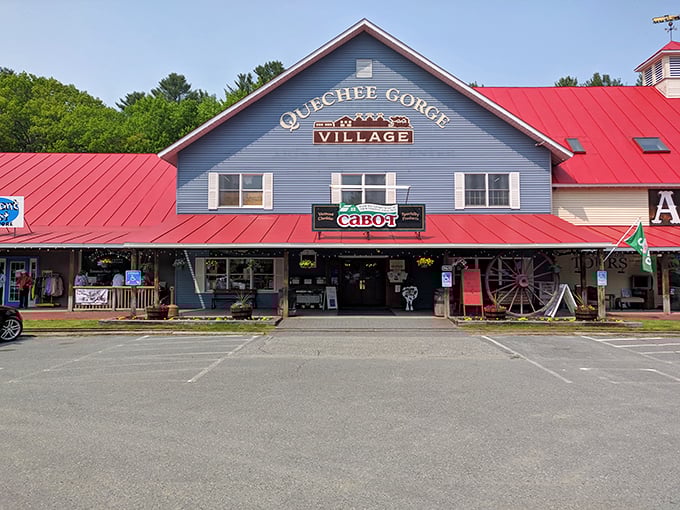 Step into Quechee Gorge Village, where the Cabot sign hints at Vermont's dairy heritage while vintage treasures await inside this charming retail destination.
