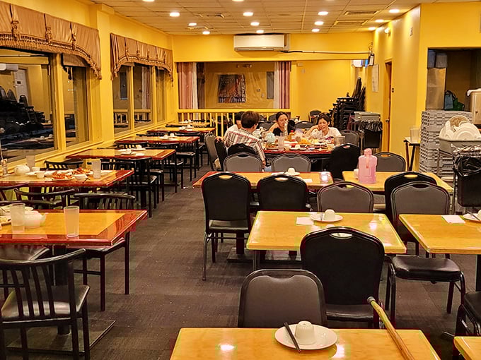 Step into a world where yellow walls radiate warmth like a buttery lobster claw. This no-frills dining room is where seafood fantasies become deliciously messy realities.