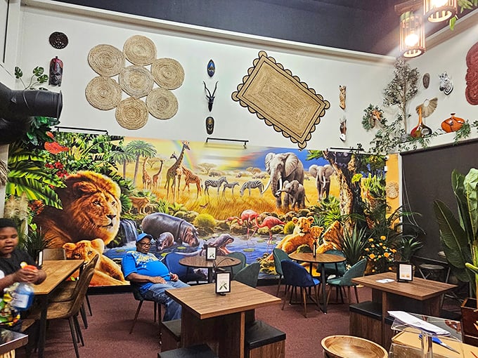 Step into a safari of sweetness! This whimsical dining area proves that cinnamon rolls and wildlife murals are a surprisingly perfect pairing.