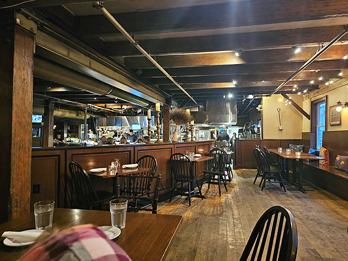 Step inside and feel the warmth wash over you like a cozy maritime hug. This isn't just dinner; it's a ticket to New England charm, served with a side of history.