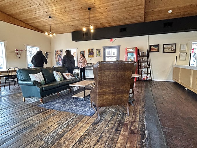 Step inside and feel the warmth! This cozy interior, with its wooden beams and comfy seating, is like a hug for your soul.