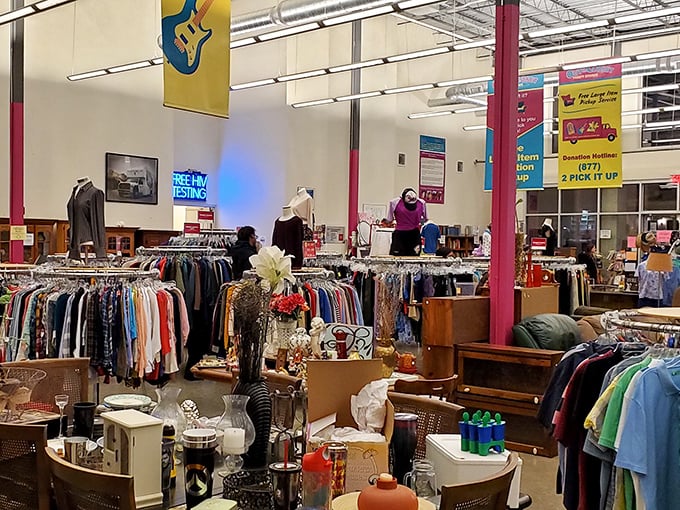 Treasure hunting in progress! Racks upon racks of potential fashion finds await, organized with surprising precision for a place where chaos could easily reign.