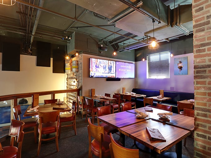 Industrial chic meets island casual in this thoughtfully designed space where sports fans and foodies find common ground over craft brews.