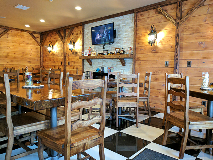 Warm wooden walls and checkered floors create the perfect Polish grandmother's dining room. You half expect to be told to finish your vegetables before leaving the table.