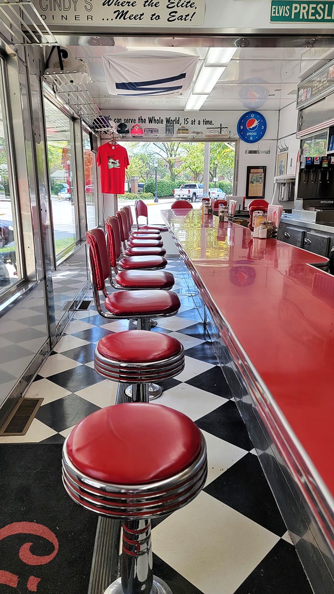 Those cherry-red stools aren't just seating&mdash;they're front-row tickets to the best breakfast show in Indiana. Note the sign: "Where the Elite Meet to Eat!"