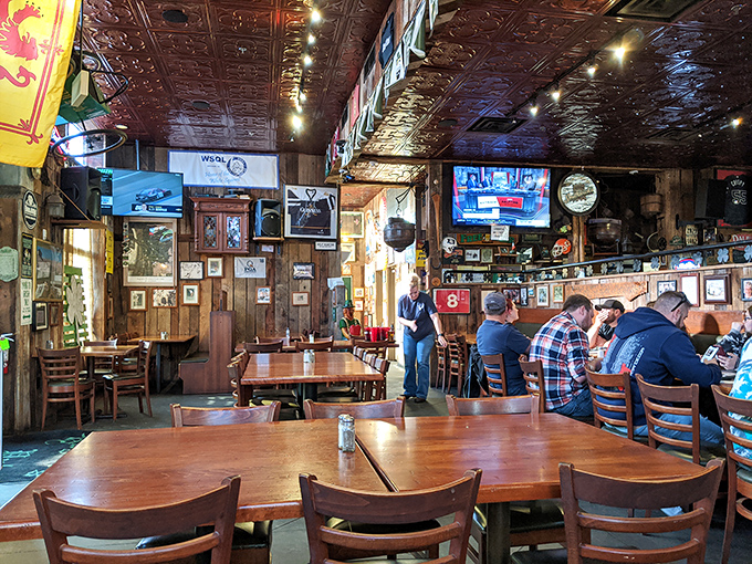 Step inside and the pressed tin ceiling, wooden walls, and classic pub atmosphere instantly tell you: authentic goodness lives here.