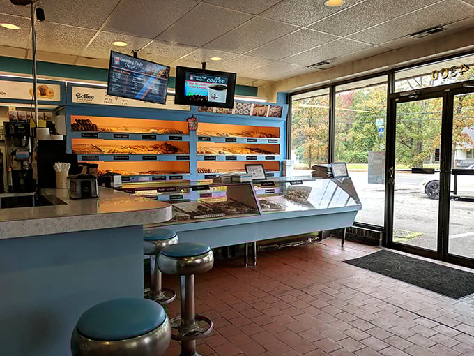Blue shelves lined with golden treasures and classic diner stools that invite you to spin like it's 1975. Simple pleasures never go out of style.