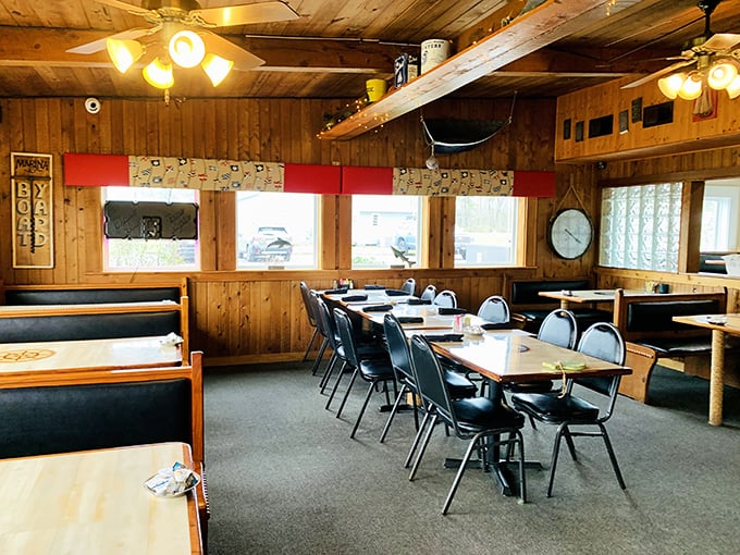 Step into a time capsule of comfort. This wood-paneled dining room whispers tales of countless satisfied diners and their epic battles with mammoth steaks.