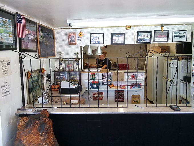 Behind that charming wrought iron barrier, culinary magic happens daily. The American flag is just a bonus patriotic reminder that tenderloin perfection is our national birthright.