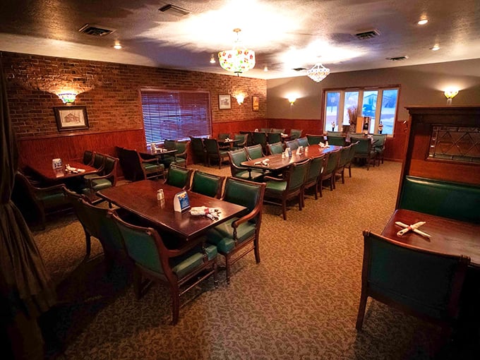 Cozy meets classy in this dining room. The chandeliers add a touch of sparkle, as if to say, "We're fancy enough for date night, casual enough for Tuesday."