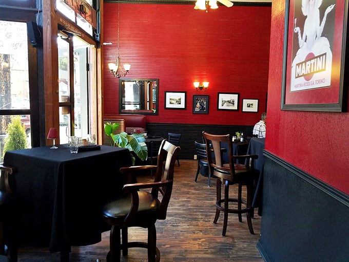 Step into a world where red walls whisper tales of juicy steaks and seafood treasures. It's like dining inside a perfectly grilled tomato!