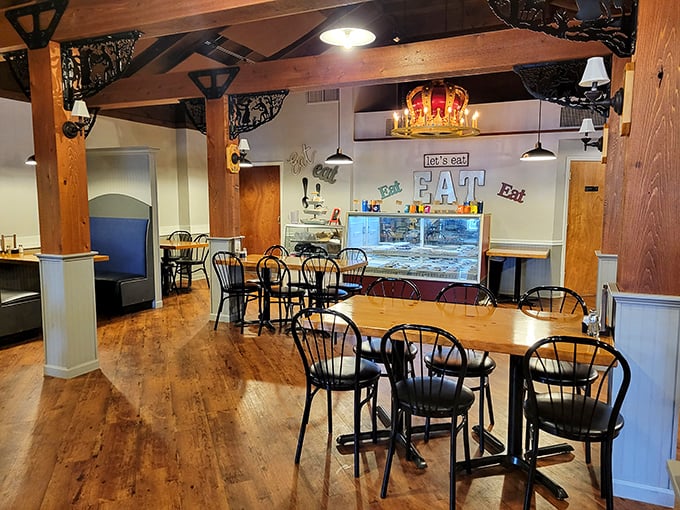 "Let's eat," indeed! This cozy dining room, complete with a regal crown chandelier, sets the stage for a feast fit for Viking kings and prairie pioneers alike.