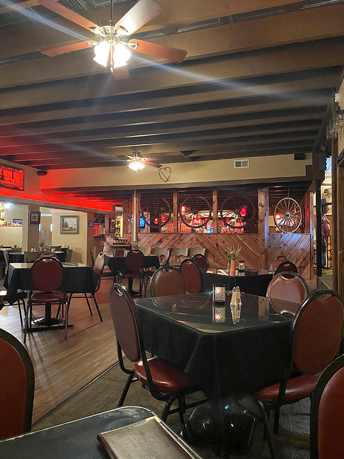 Step into a rustic wonderland where wagon wheels meet mood lighting. It's like the Old West got a makeover from HGTV!