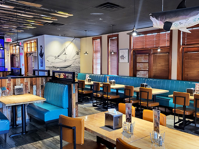 "Step into a nautical dream. The blue booths and wooden accents make you feel like you're dining on a luxury yacht."