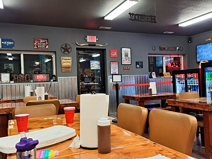 Step into a carnivore's dream! The interior is a delightful mishmash of rustic charm and BBQ memorabilia that'll make you feel right at home.