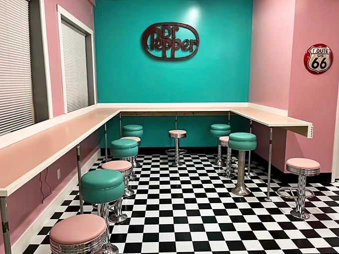Step inside and prepare for a Technicolor time warp. With its bubblegum pink walls and turquoise accents, this diner is like a Wes Anderson film come to life.