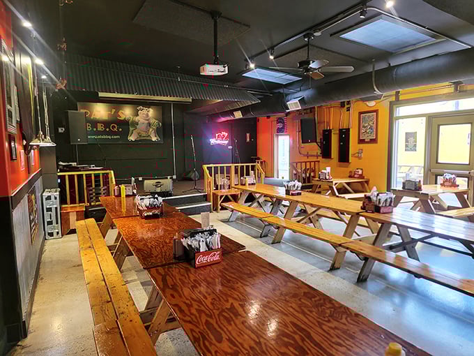 Step into BBQ heaven: Pat's interior is where picnic tables meet rock concert vibes. Prepare for a taste explosion!