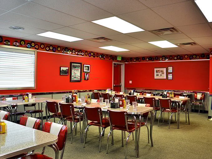 Red booths and vintage vibes galore! This interior screams "Happy Days" meets "Grease" – you'll half expect the Fonz to walk in any minute.