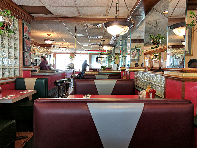 Step into a time capsule of comfort! With its retro booths and cozy ambiance, George's interior feels like a warm hug from your favorite aunt &ndash; if your aunt could cook like a Michelin-starred chef.