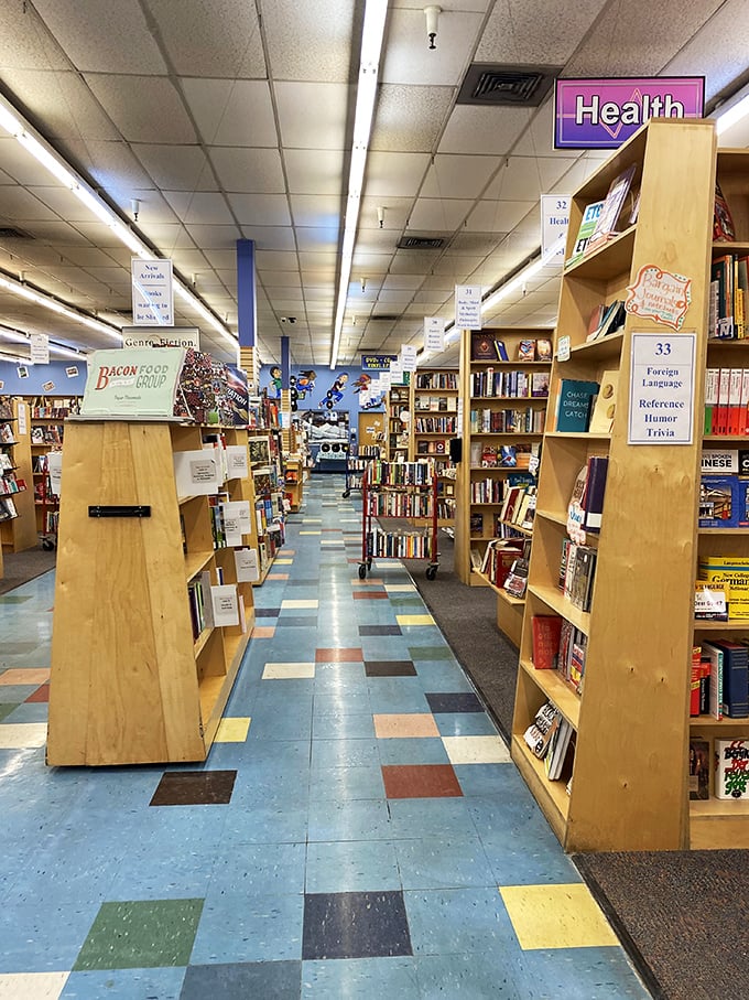 Step into a bibliophile's dream! Colorful floor tiles lead the way through aisles of literary adventures waiting to be discovered.