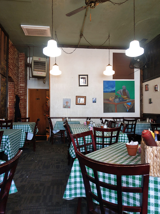 Step into a time warp of taste! The interior's checkered charm and local art create an atmosphere cozier than your favorite sweater on a crisp autumn morning.