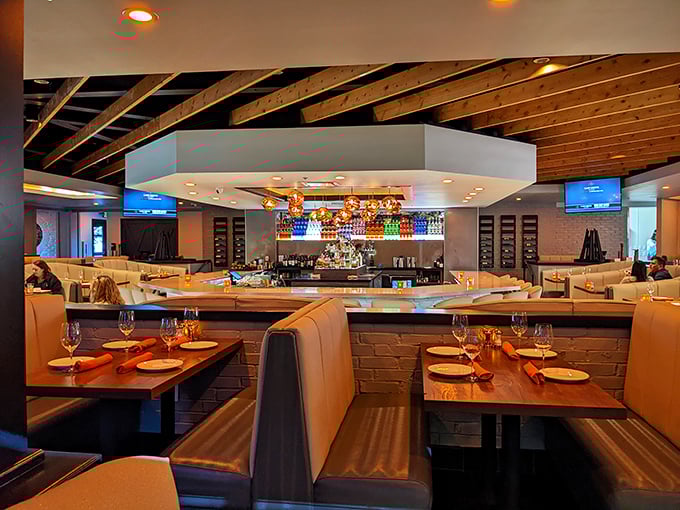 Step inside and you're transported to a chic coastal hangout. With its warm wood and sleek design, it's like a beach house got a city makeover.