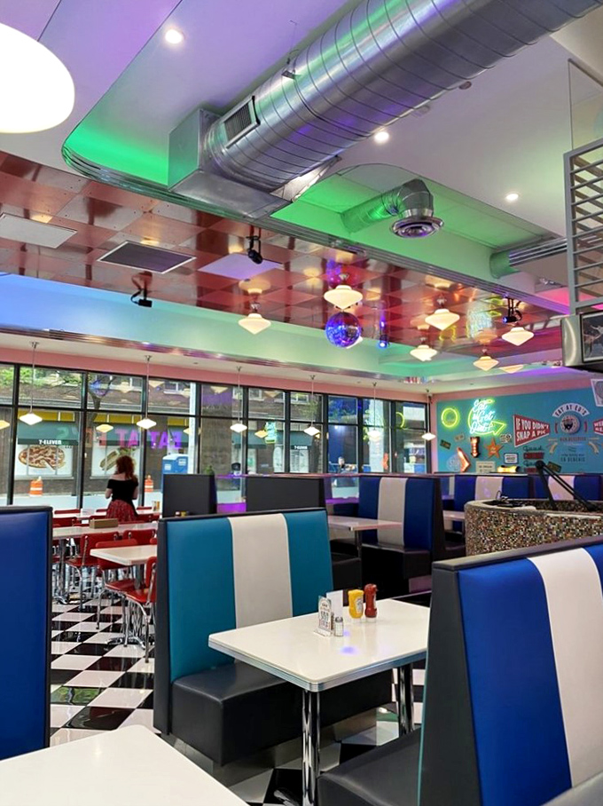 Neon dreams and chrome gleams! Ed's interior is a feast for the eyes, with enough kitsch to make even Elvis say, "That's too much, baby."