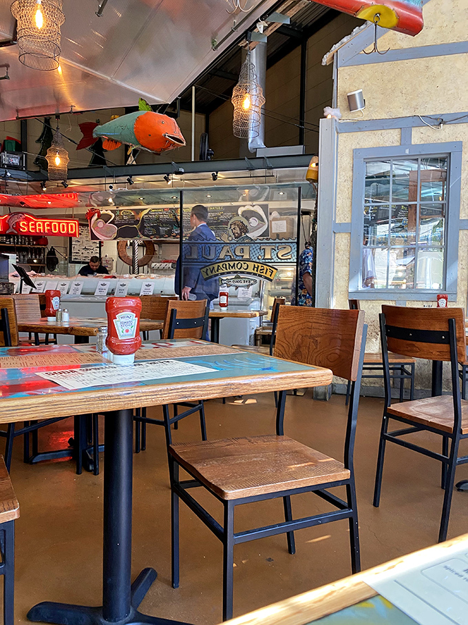 Step into a nautical wonderland where fish-shaped lamps and colorful buoys set the stage for an underwater feast. Dive in!