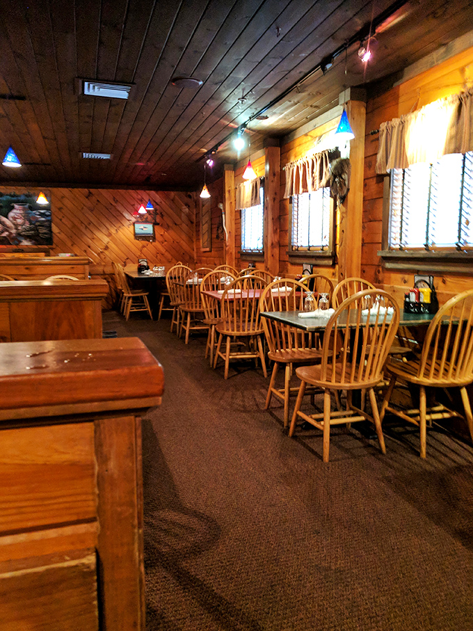 Step inside and you'll feel like you've wandered into a cozy mountain retreat. The wood paneling practically whispers, "Stay a while, won't you?"