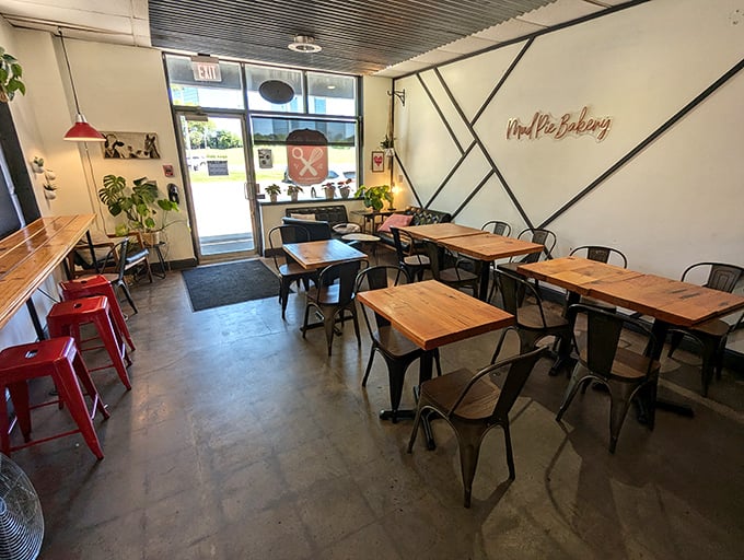 Step inside and feel the cozy embrace of industrial chic. It's like your cool aunt's loft apartment, but with better snacks.