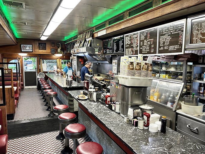 Welcome to the heart of comfort food paradise! Red vinyl stools and a bustling counter invite you to pull up a seat and stay awhile.