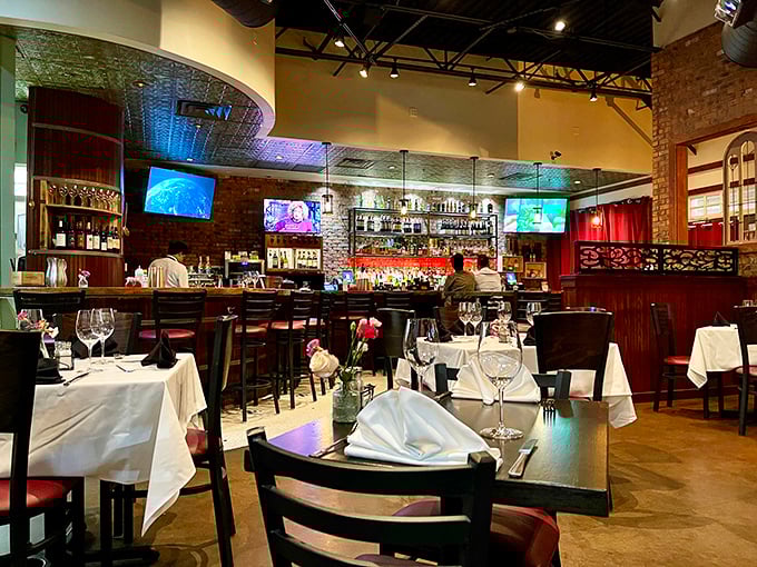 Step inside and prepare for a feast for the senses. The warm lighting and exposed brick create an atmosphere that's part cozy bistro, part sophisticated dining experience.