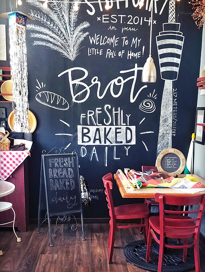 Step into a world where chalkboard art meets comfort food. This cozy interior is like a warm hug for your taste buds.
