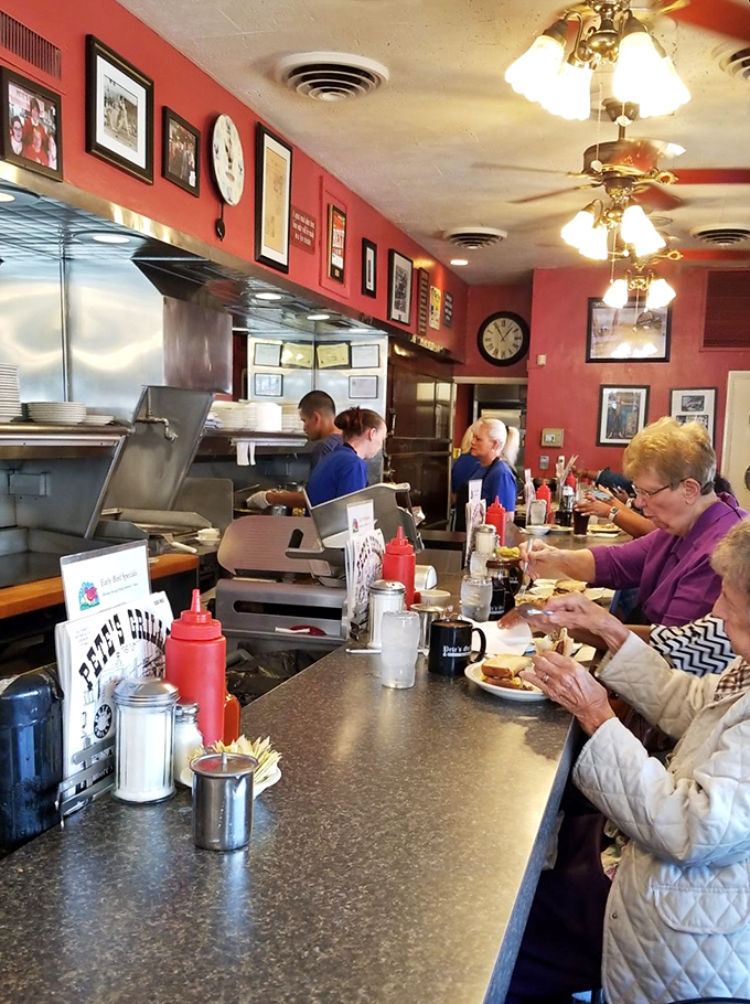 Step into a time capsule of comfort! Pete's interior is a cozy cocoon of red walls, nostalgic photos, and the promise of hearty meals to come.