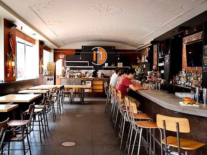 Step inside and feel the buzz! Nosh's interior blends modern chic with cozy comfort, like your coolest friend's living room &ndash; if that friend was a gourmet chef.