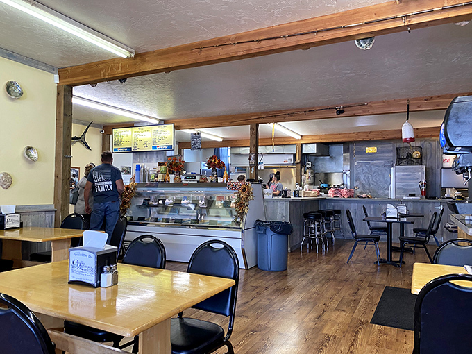 Step into a cozy cabin of culinary wonders. This interior whispers "Wyoming" while shouting "fresh catch of the day!"