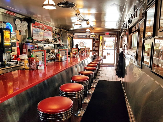 Step into a time machine disguised as a diner. Red vinyl stools and a gleaming counter invite you to pull up a seat and stay awhile.