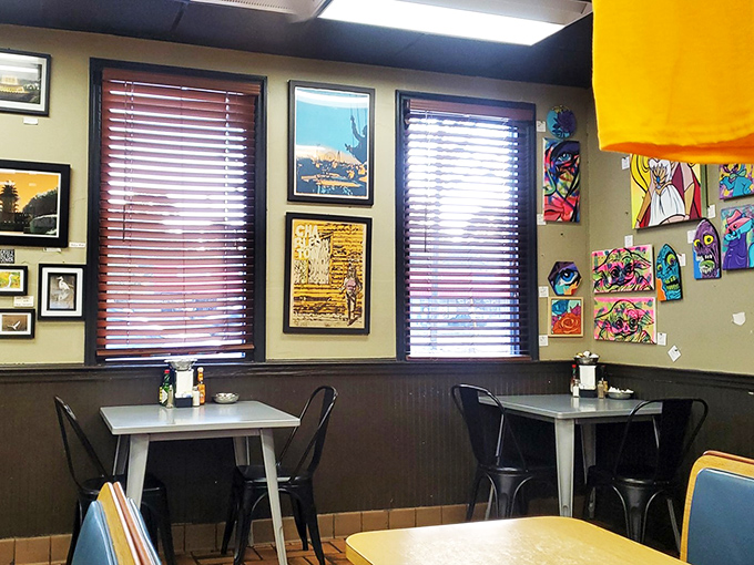 Step into a cozy time capsule where local art meets comfort food. It's like your cool aunt's living room, but with better pancakes.