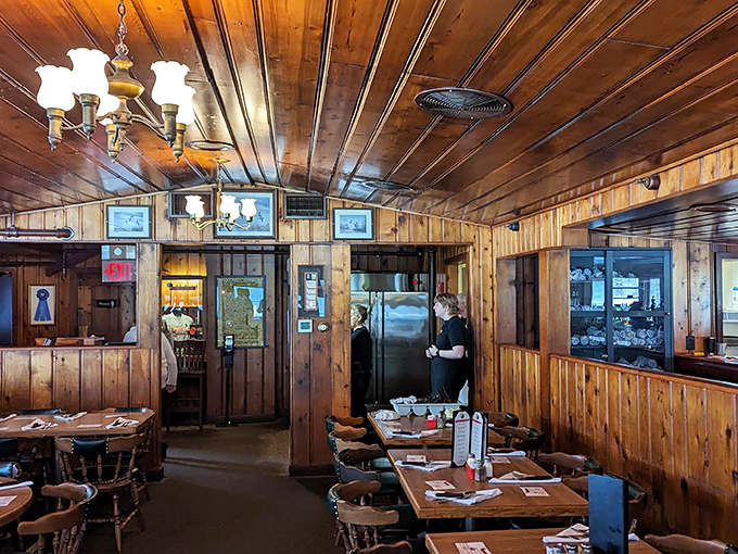 Step into a time capsule of culinary nostalgia. This wood-paneled wonderland is where memories are made and steaks are perfected.