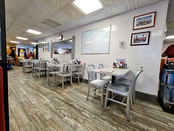 Step into a time capsule of comfort. The classic diner interior whispers tales of countless satisfied patrons and bottomless coffee refills.