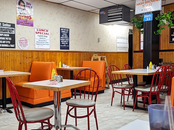 Step into a time capsule of comfort! Swift's interior is a delightful throwback, where orange booths and red chairs create a cozy haven for early risers.